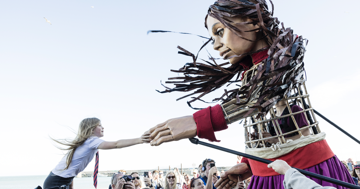 Little Amal, a 12-foot puppet of a young female Syrian refugee, will ...