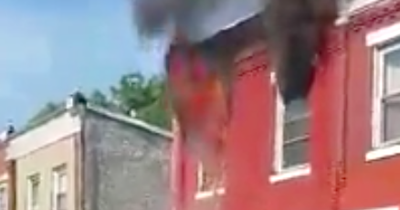 Watch: Flames burst windows, man escapes house fire in N. Philadelphia ...